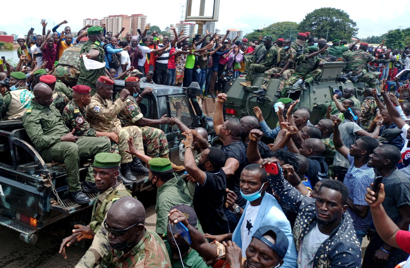 Guinea coup leader promises national government as politicians arrested ...
