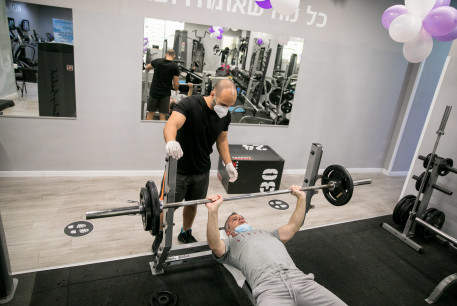 Israelis exercise at the Sky gym club of Rav Chen in Jerusalem on May ...