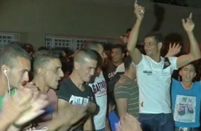 Palestinians in Hebron cheer as Gaza rockets fly toward Israeli ...
