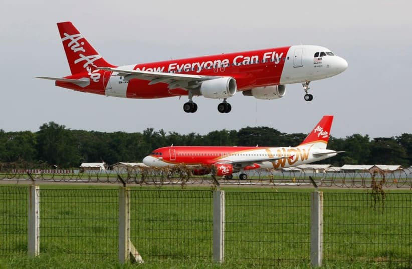 Indonesia halts search for missing AirAsia plane as night falls - The ...